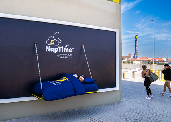 GymNation takes NapTime™ to the streets with 'sleeping billboard ...